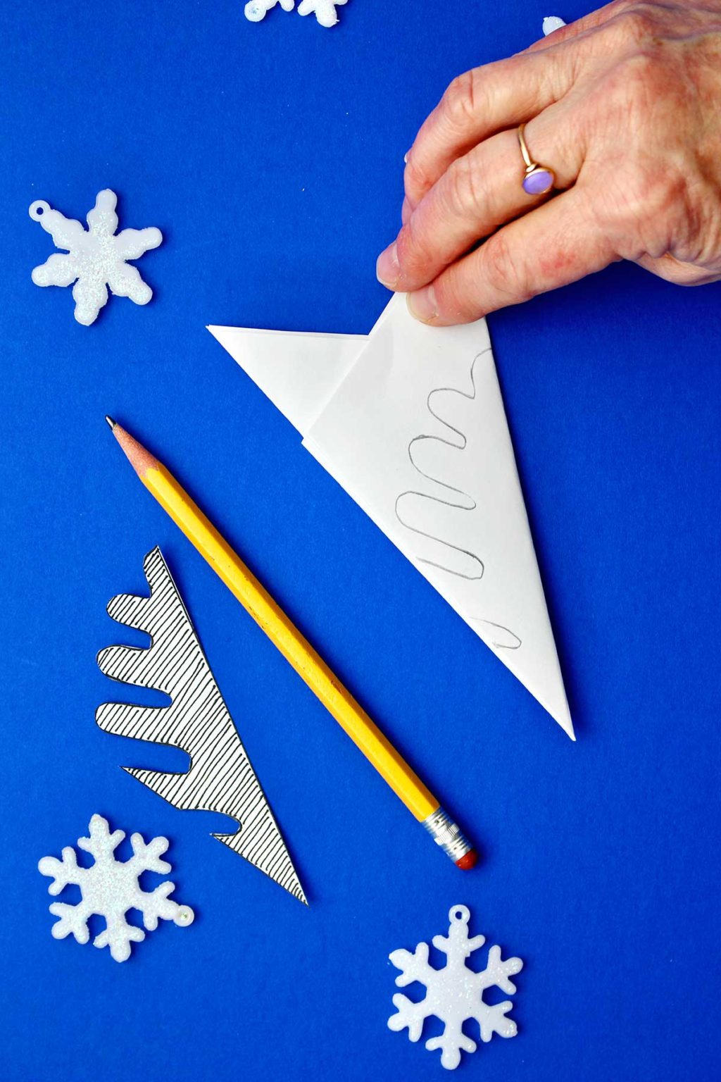 Easy Paper Snowflake Template (Printable designs + How to make your own!)